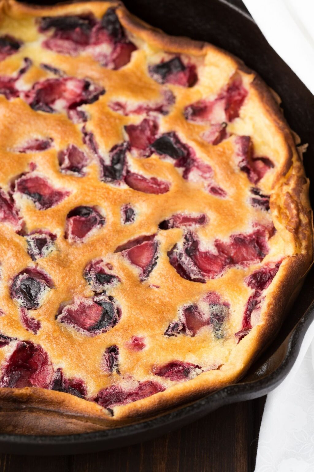 Roasted Plum Clafoutis Recipe l Baked by an Introvert
